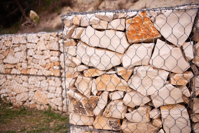 Piled Stones Enclosed in Wire Mesh for Construction Stock Image - Image ...