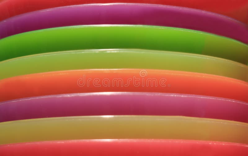 Piled Up Colorful Plastic Plates, Background Stock Image - Image of ...