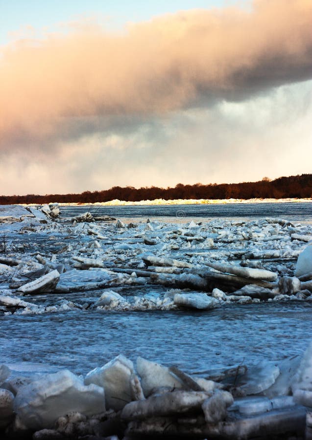 Piled Up Ice with Orange Cloud Stock Image - Image of rocks, clouds ...