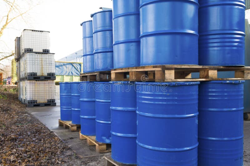 Piled up oil barrels stock photo. Image of cargo, canister - 38359538
