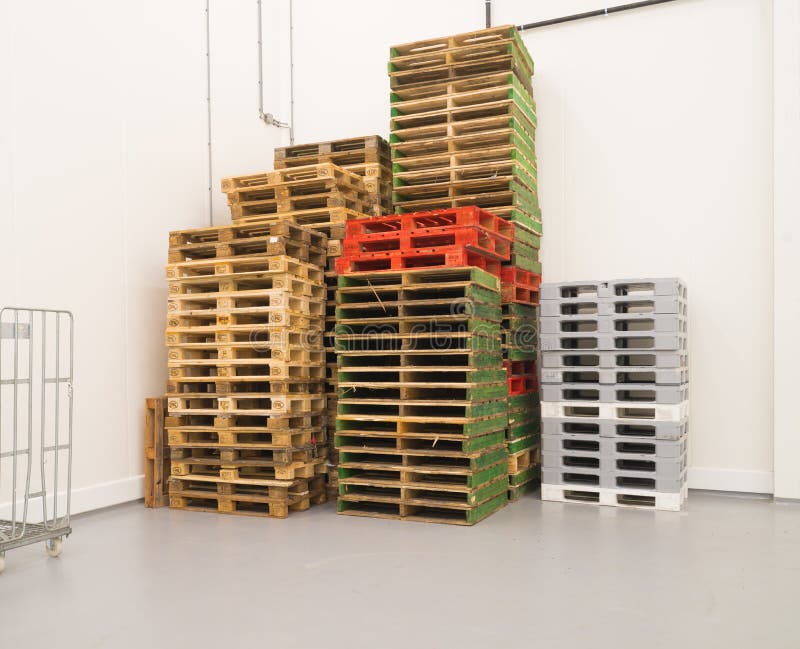 Piled up pallets stock image. Image of reusable, load - 76779671