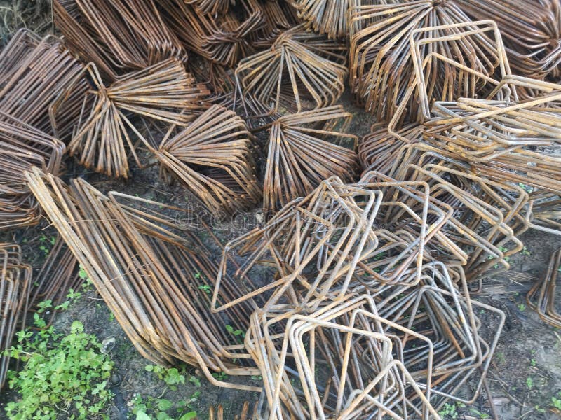 Piles of Bent Square-shaped Rusty Steel Grid Reinforcement Frame Lying ...