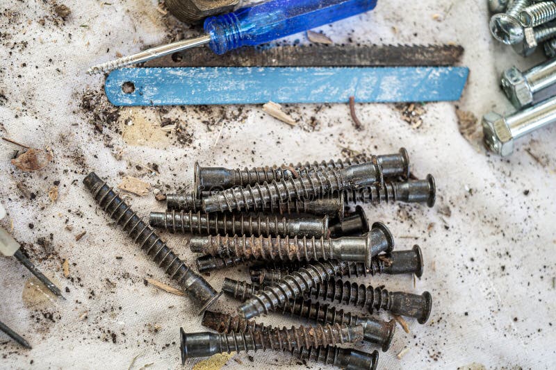 Piles of Bolts Tools and Different Hardware on a Drop Sheet Stock Image ...