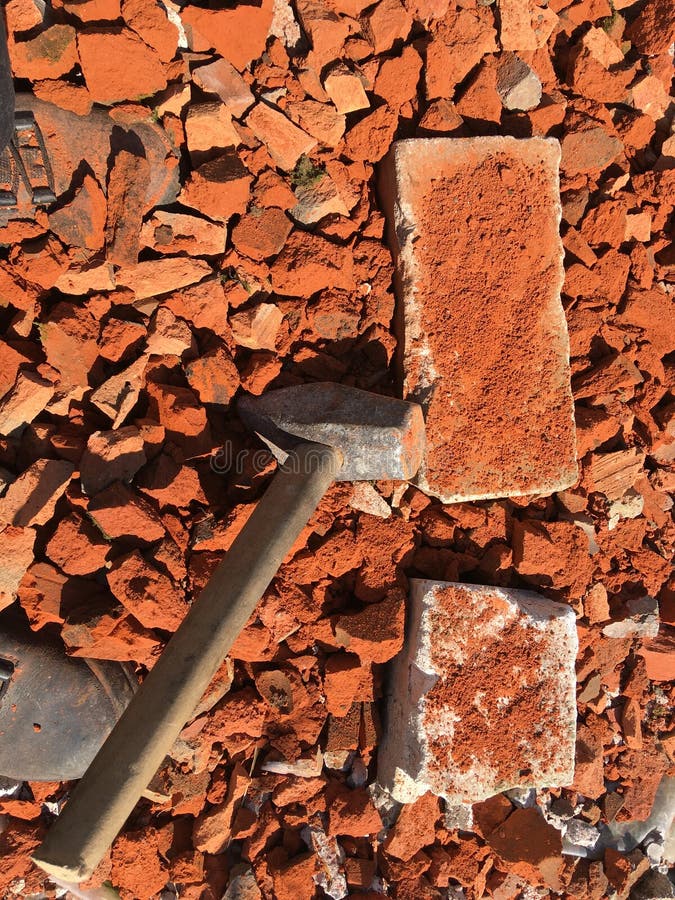 Piles of broken red bricks stock photo. Image of decor - 192730480