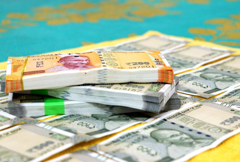 Piles of New Indian Currency Notes Rupees 200 and 500 Stock Image ...