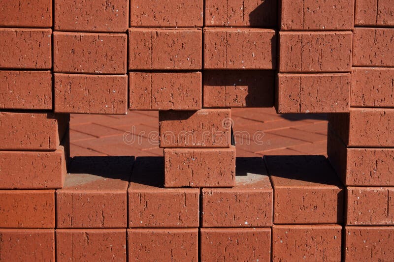 Piles of new red bricks stock image. Image of background - 220221961
