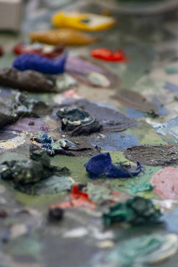 Piles of Paint on a Messy Art Board Stock Photo - Image of chaos ...