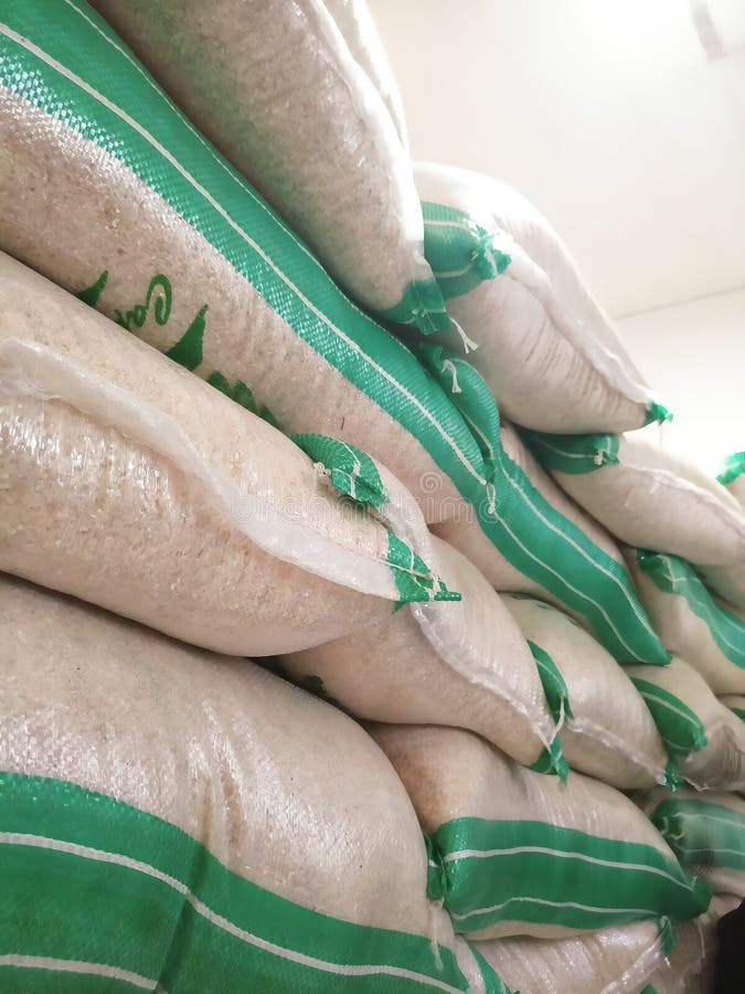 Piles of rice in warehouse stock image. Image of leaf - 276552305