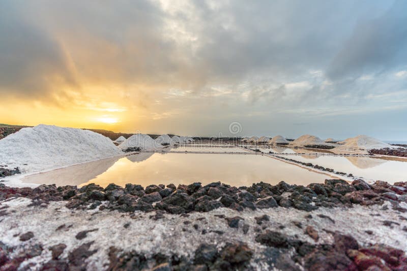 Piles of Salt Over the Salt Mine Ponds at Dawn Stock Image - Image of ...