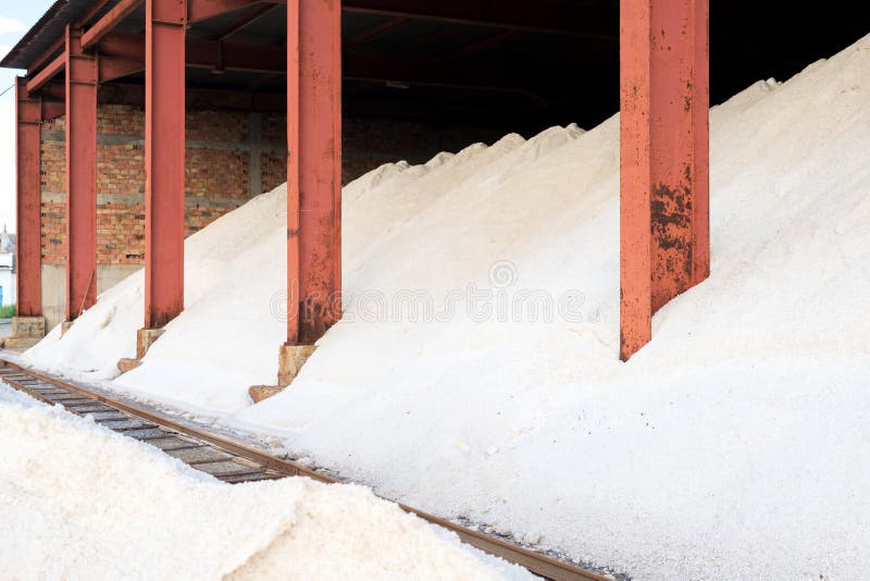 Piles of salt in a storage stock image. Image of mining - 77408405