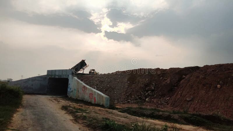 Piles of Soil and Dump Trucks at the Project Site Stock Image - Image ...