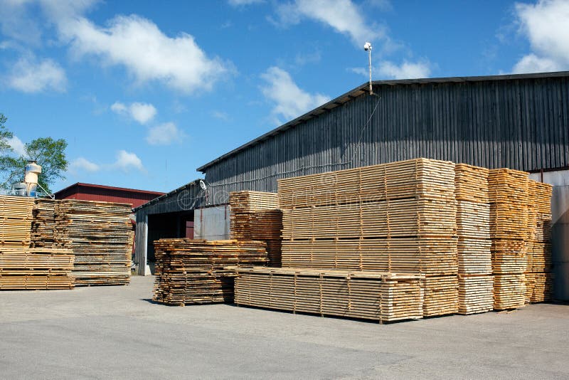 Piles of Stacked Rough Cut Lumber at a Sawmill Stock Photo - Image of ...