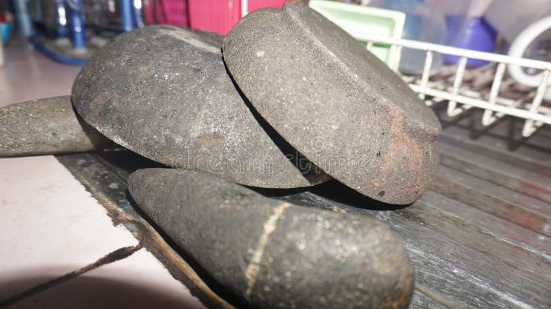 Piles of Tools for Mashing the Kitchen Ingredients Made of Strong Stone ...