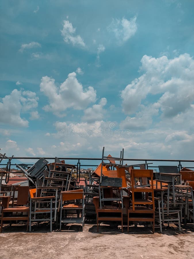 Piles of unused chairs stock photo. Image of watercraft - 266977914