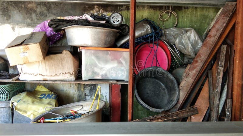 Piles of Unused Items in a Cupboard in the Warehouse Stock Photo ...