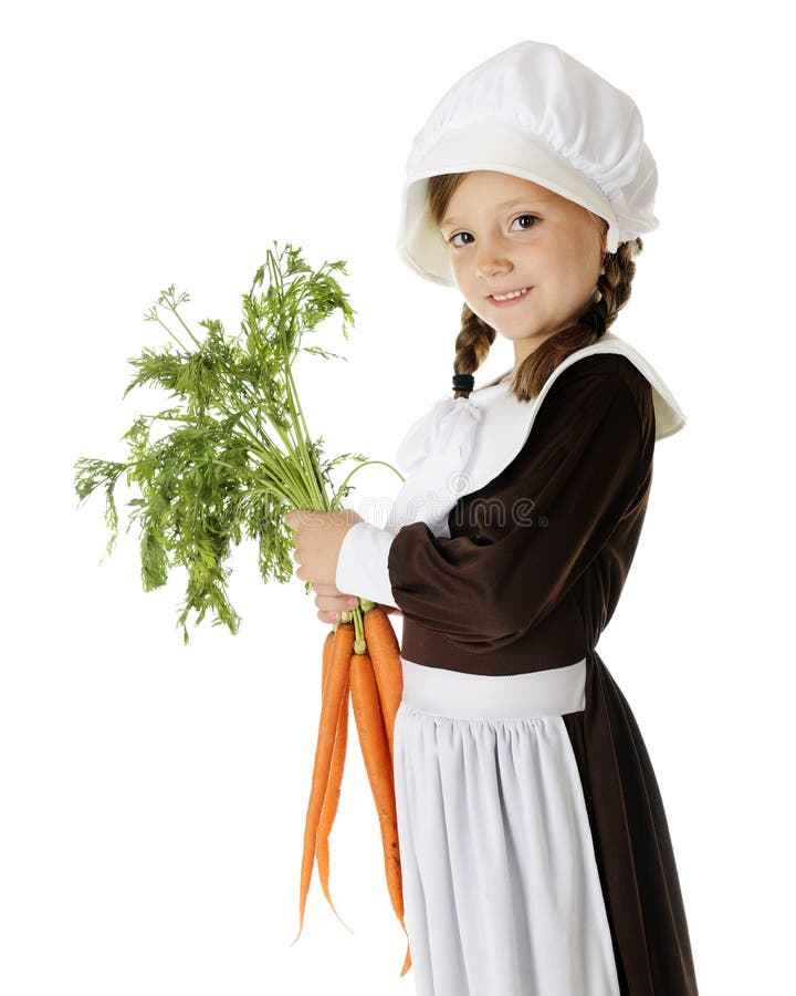 Pilgrim Girl with Carrots stock photo. Image of pretty - 26559308