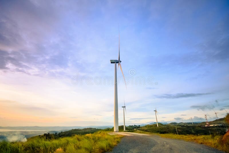 Pililia Windmill Farm at Sunset Stock Photo - Image of electric ...