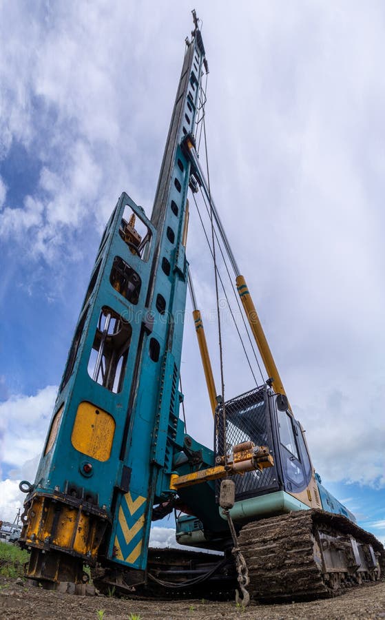Piling Machine at a Construction Site, Shot with Distortion by a Short ...