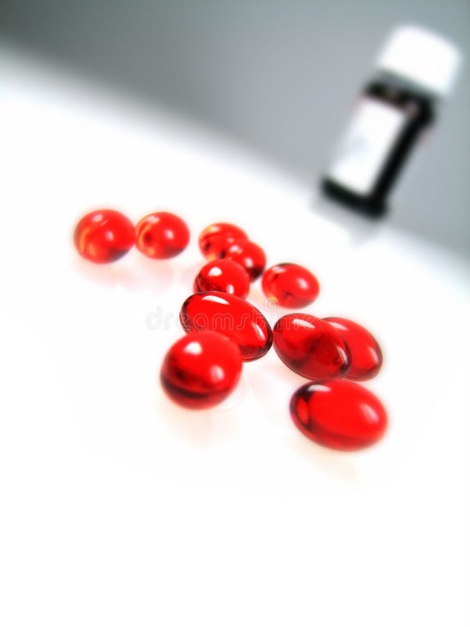 Red caffeine Pills stock photo. Image of caffeine, bright - 7048372