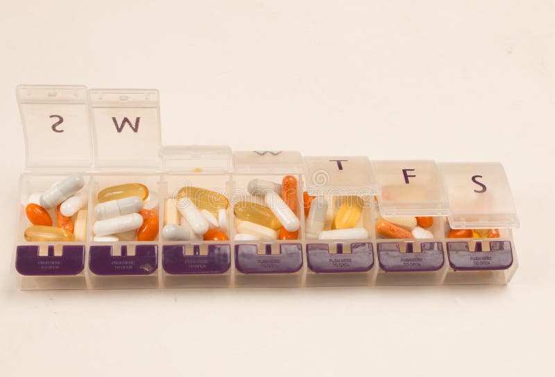 Daily Pill Box Full of Vitamins and Medications Stock Photo - Image of ...
