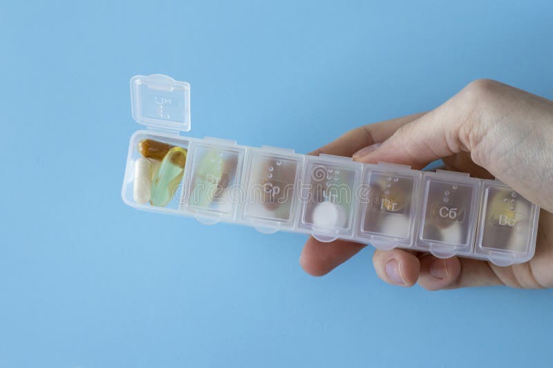 Pill Box. Medicine Container in the Hands of a Woman Stock Photo ...