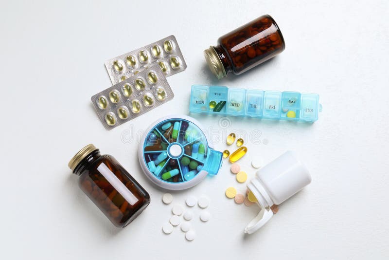 Pill Boxes with Medicaments on White Table, Flat Lay Stock Image ...