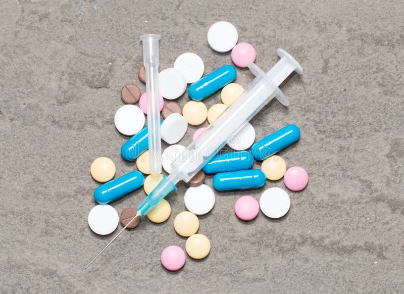 Pill and syringe. stock image. Image of vitamin, capsule - 39491065