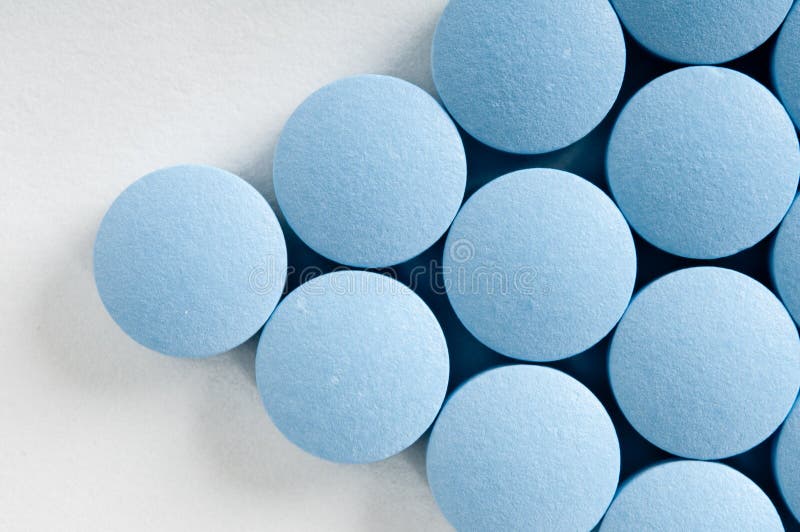 Pill Triangle . Isolated on Turquoise Background Stock Photo - Image of ...