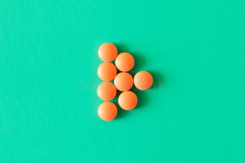 Pill Triangle . Isolated on Turquoise Background Stock Photo - Image of ...