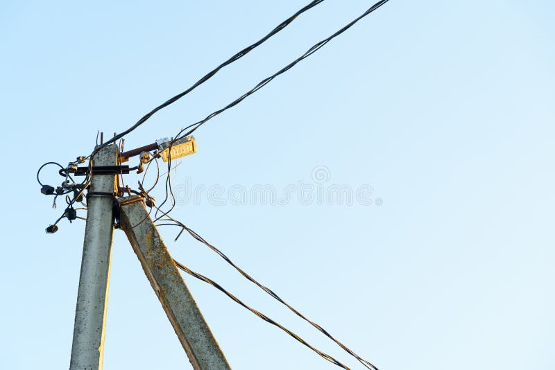 Pillar with Electric Wires and a Lantern. Electrical Communications ...