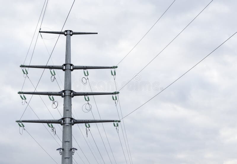 Pillar and Power Lines Against a Cloudy Sky 2 Stock Image - Image of ...