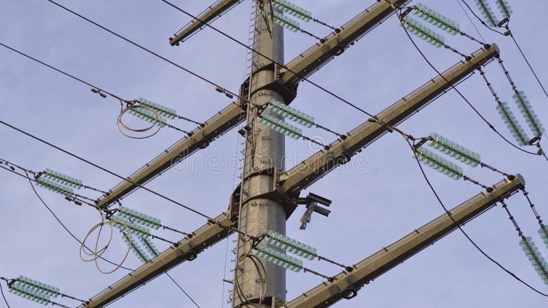 Pillar and Power Lines Against a Cloudy Sky Stock Photo - Image of ...