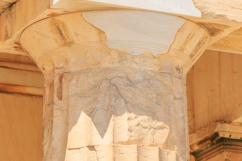 A Pillar with a White Base and a Brown Top, Acropolis in Athens Stock ...