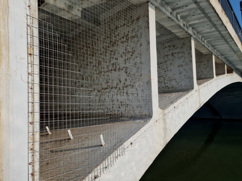 The Pillars of the Arch Bridge are Covered with Netting To Prevent ...