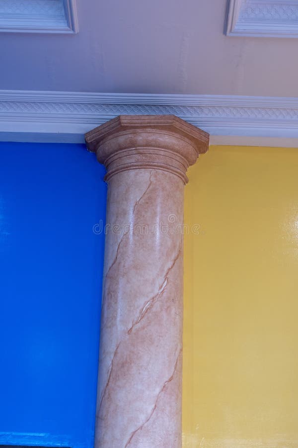 Pillars of a Building with Walls on Different Colored Sides Stock Image ...