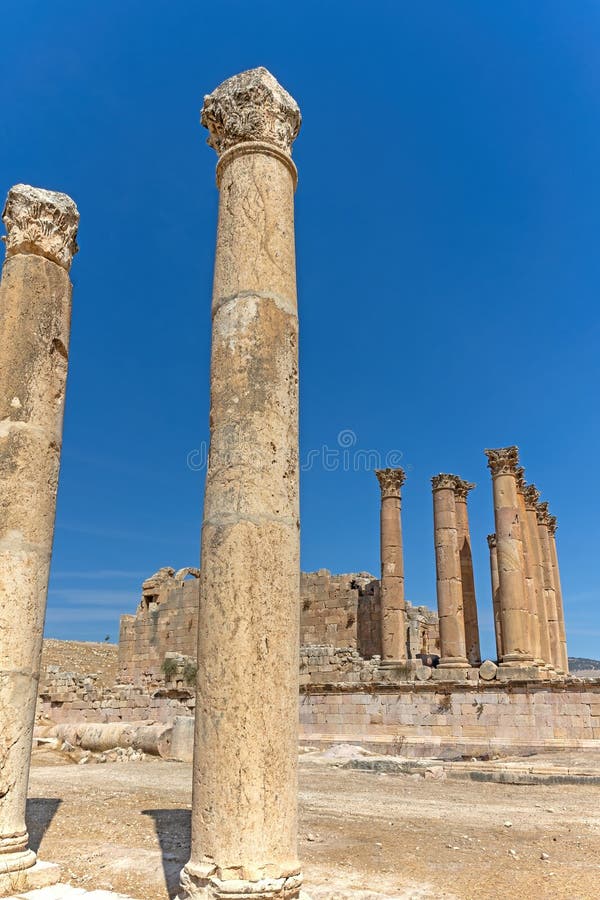 Pillars in Jerash. the Temple of Artemis is in the Background Stock ...