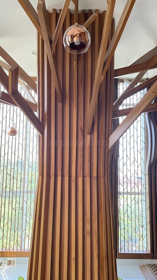 The Pillars of the Building are Wrapped in Wood that Resembles a Tree ...