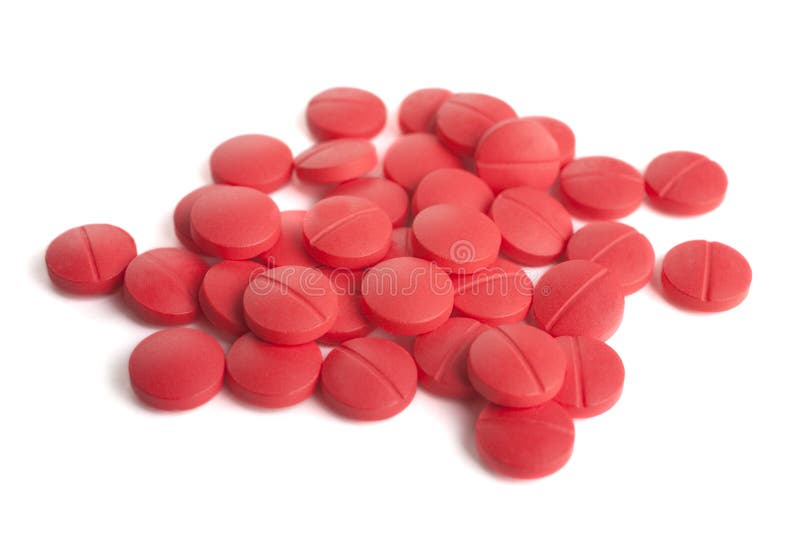 Pillole rosse su bianco fotografia stock. Immagine di isolato - 116246604