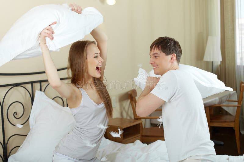 Pillow battle stock photo. Image of lifestyle, male, emotion - 56188178