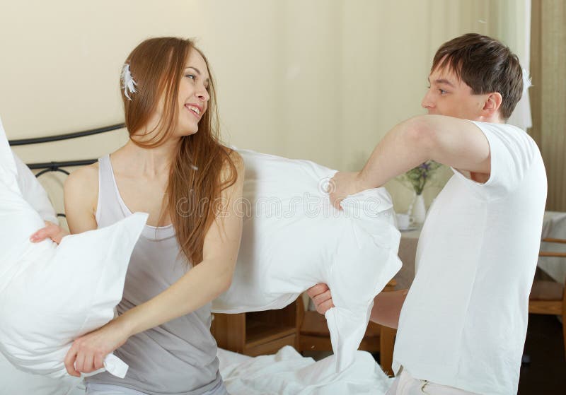 Pillow battle stock image. Image of female, emotion, handsome - 58243291