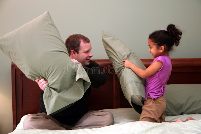 Pillow fight stock photo. Image of laughing, people, cute - 12611604