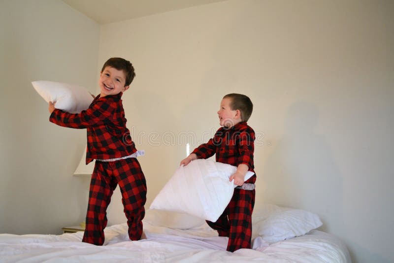 Pillow fight stock image. Image of pillow, jumping, bedtime - 47553839
