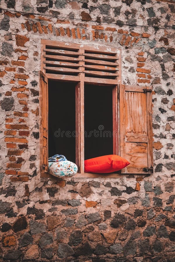Pillows and Bolsters that are Drying on the Window Stock Image - Image ...