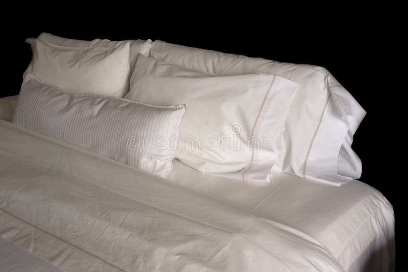 Pillows on a hotel bed stock photo. Image of pillow, wrinkle - 7519884