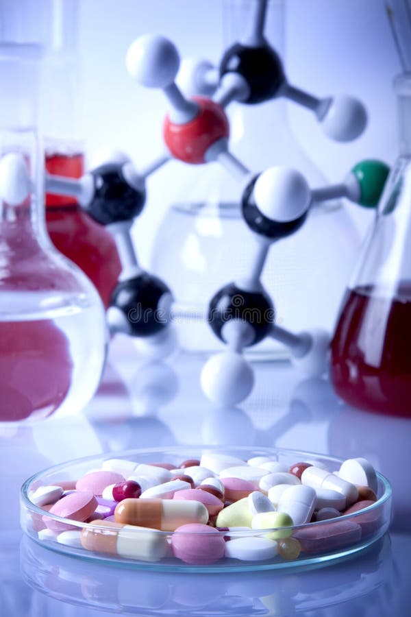 Pills and Atoms! stock image. Image of dark, atom, blue - 12438077