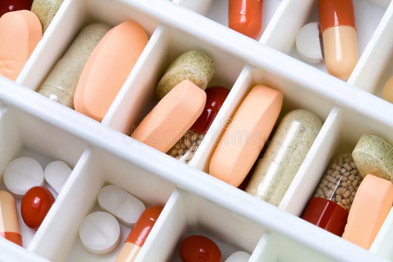 Pills in the box stock image. Image of orange, drugs - 11608833