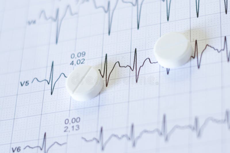 Pills for Bp on a Electrocardiogram Papers Stock Photo - Image of ...