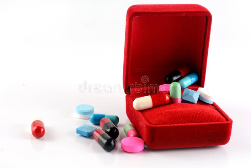 Pills Capsule in Red Gift Box Stock Photo - Image of pharmaceutical ...