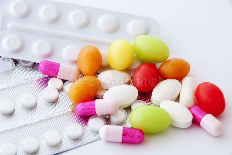 Stack of Pills and Capsules Stock Photo - Image of pharmaceuticals ...