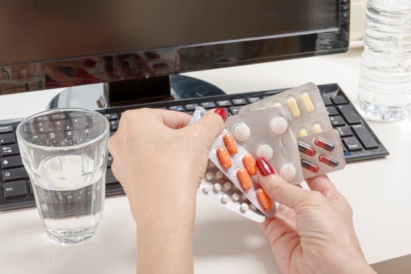 Pills with a Computer, Work Pressure Concept. Stock Photo - Image of ...